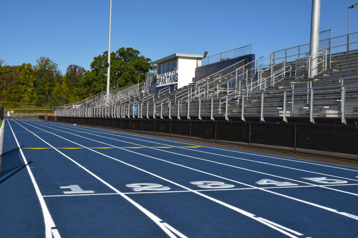 ATT Sports Inc | Examples of blue running tracks
